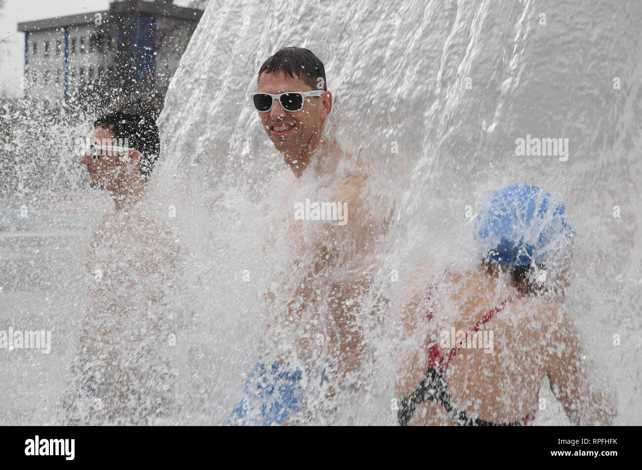 Karlsruhe, Germany. 22nd Feb, 2019. Visitors of the outdoor swimming ...
