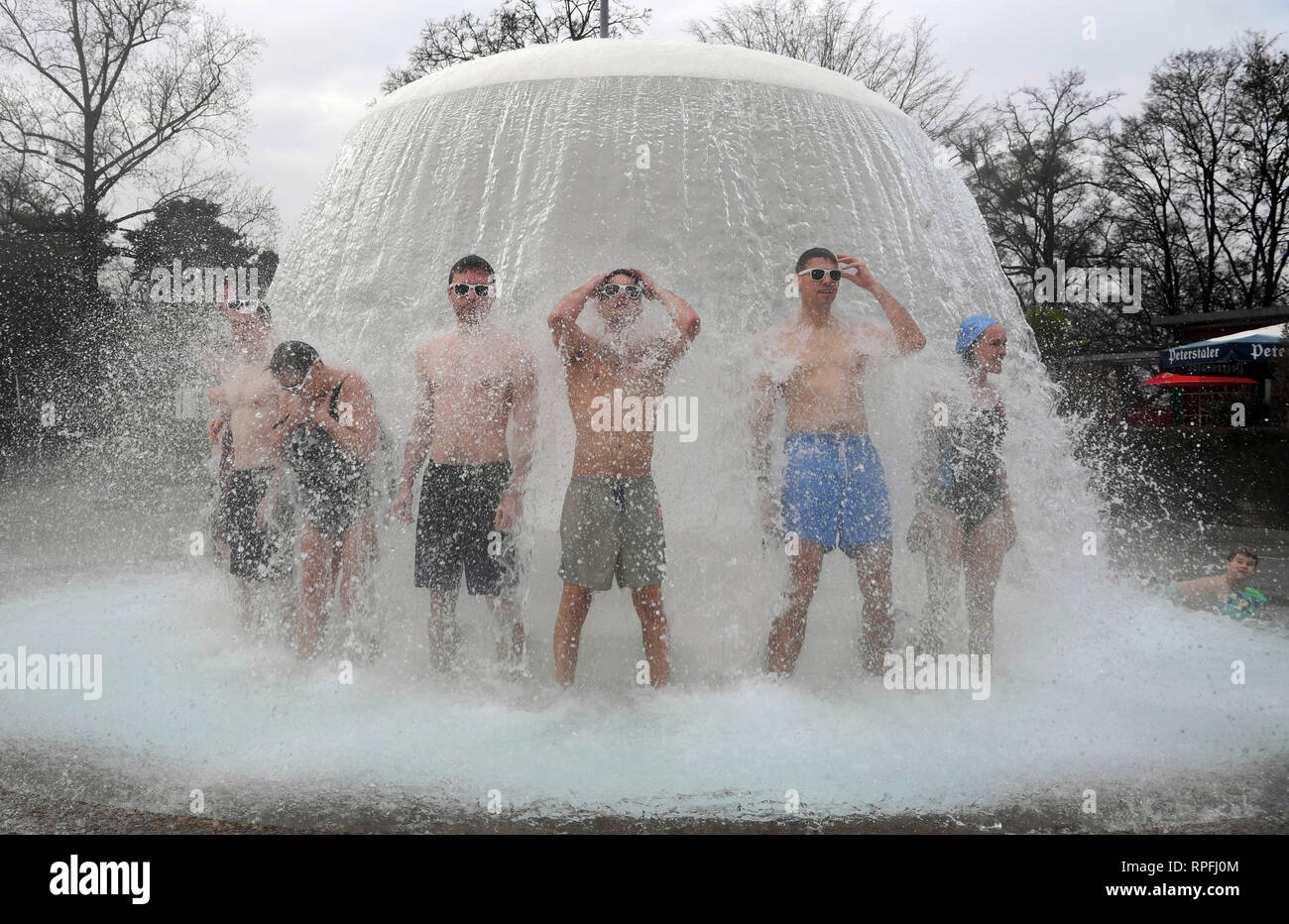 Karlsruhe, Germany. 22nd Feb, 2019. Visitors of the outdoor swimming ...