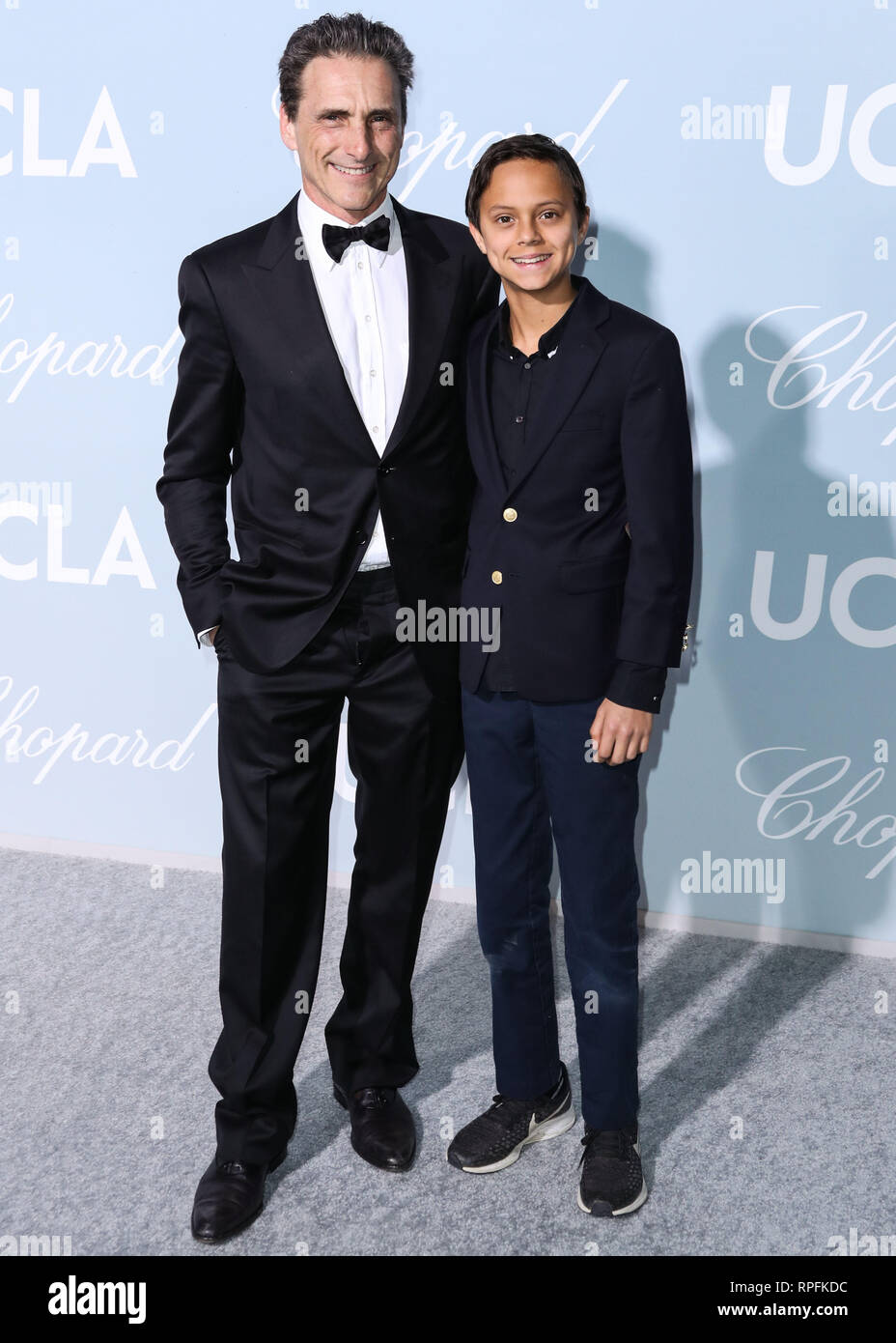 Actor Lawrence Bender and son Misha Bender arrive at the 2019 Hollywood ...