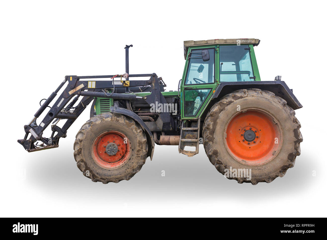 Side view of a powerful tractor designed for various works on a country ...