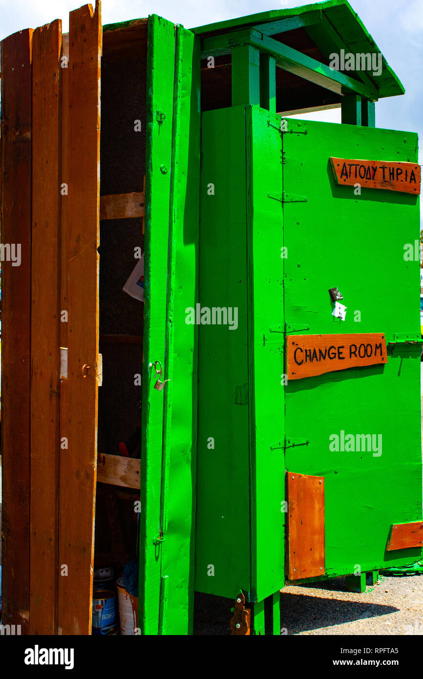 Wooden green change room on the beach. Beach tourism concept image ...