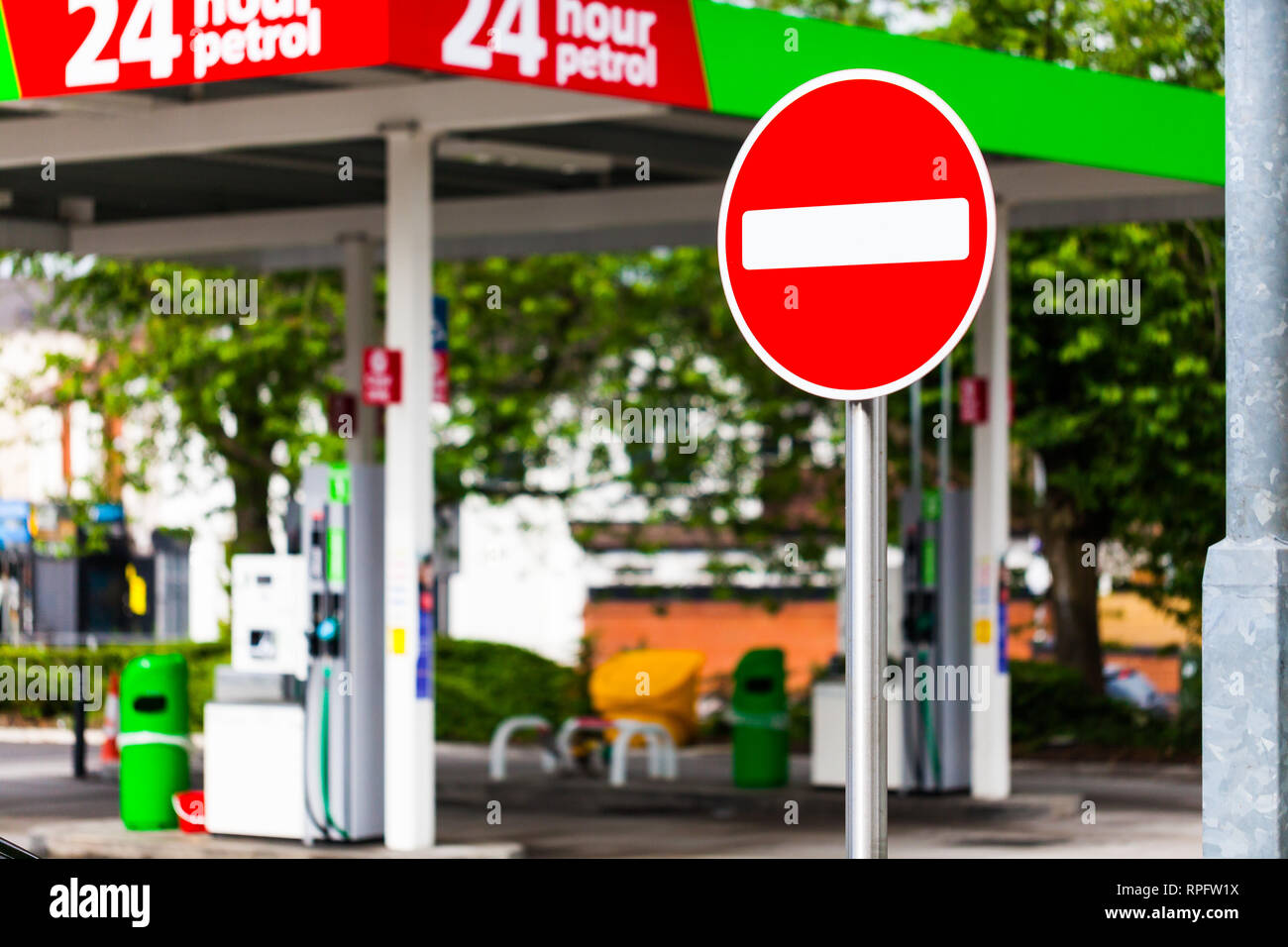 One way sign on the gas station. Industry and energy concept with ...