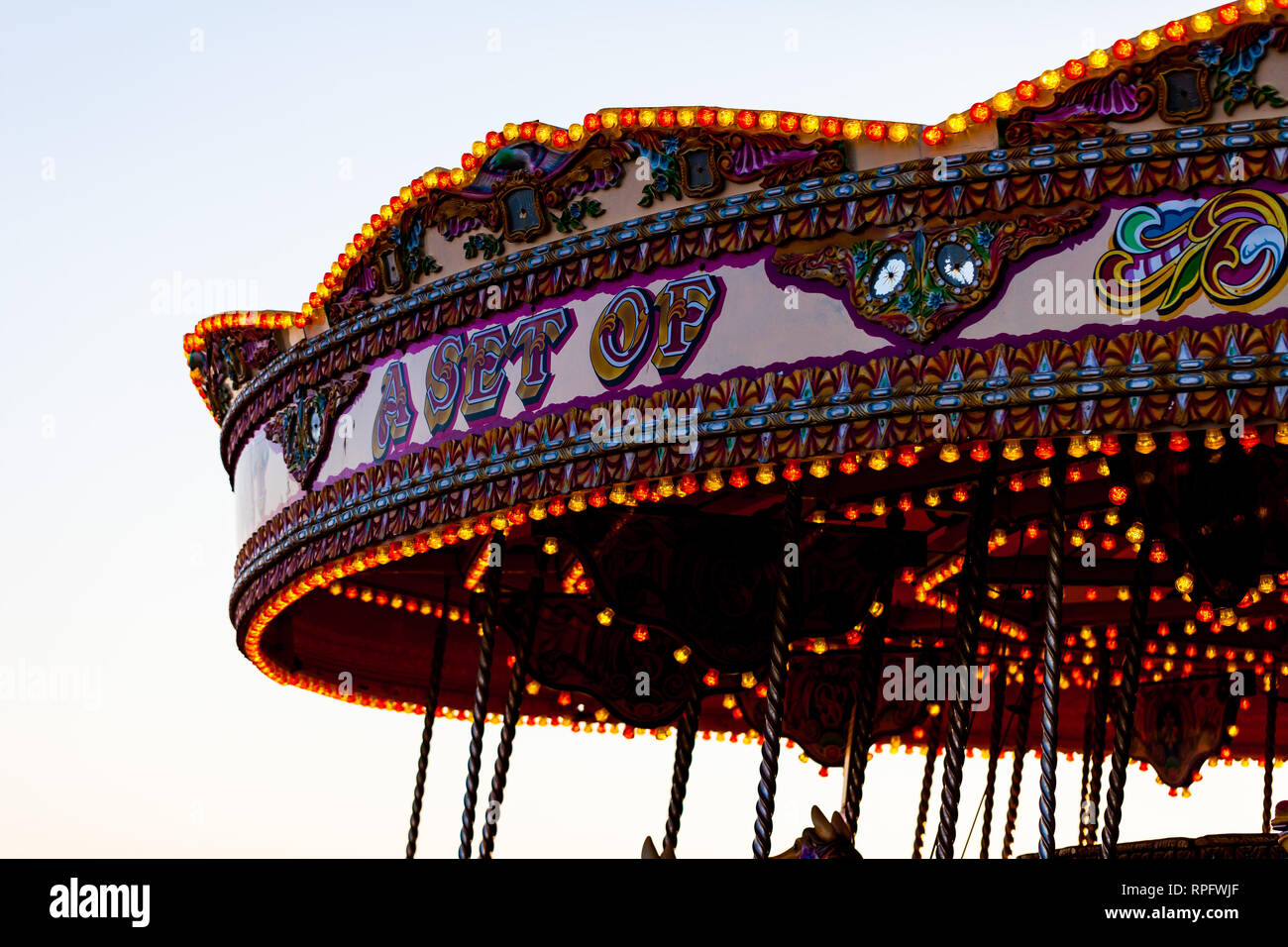 Carousel with beautiful lights. Kids entertainment and joy concept with ...
