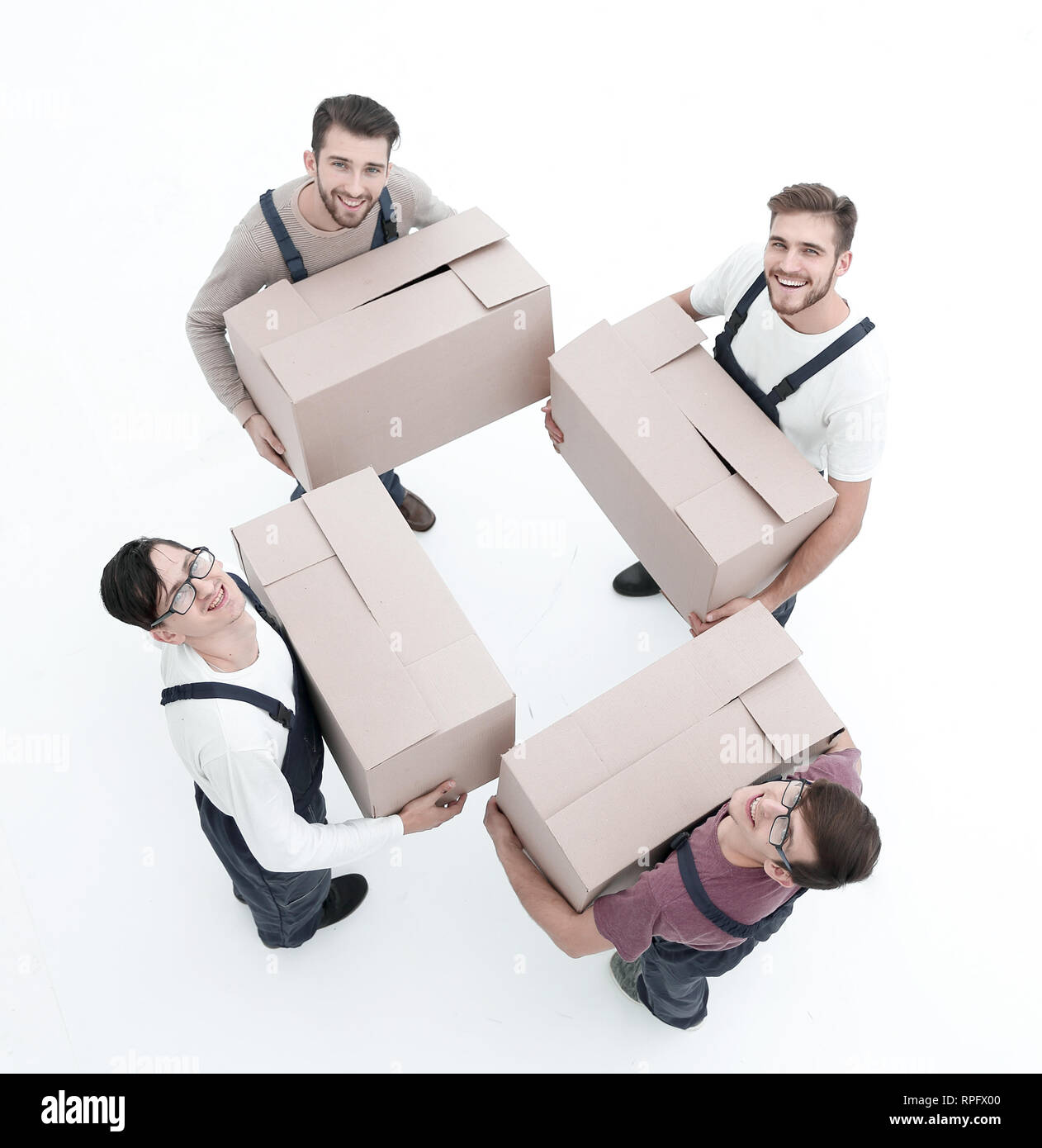 Delivery men with cardboard boxes on white background Stock Photo - Alamy