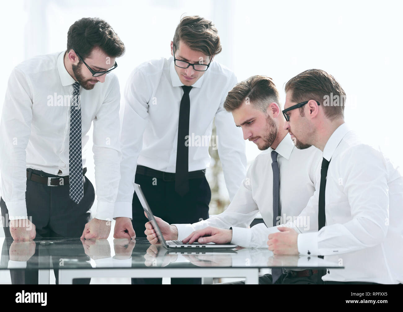 group of employees discussing the incoming information Stock Photo - Alamy