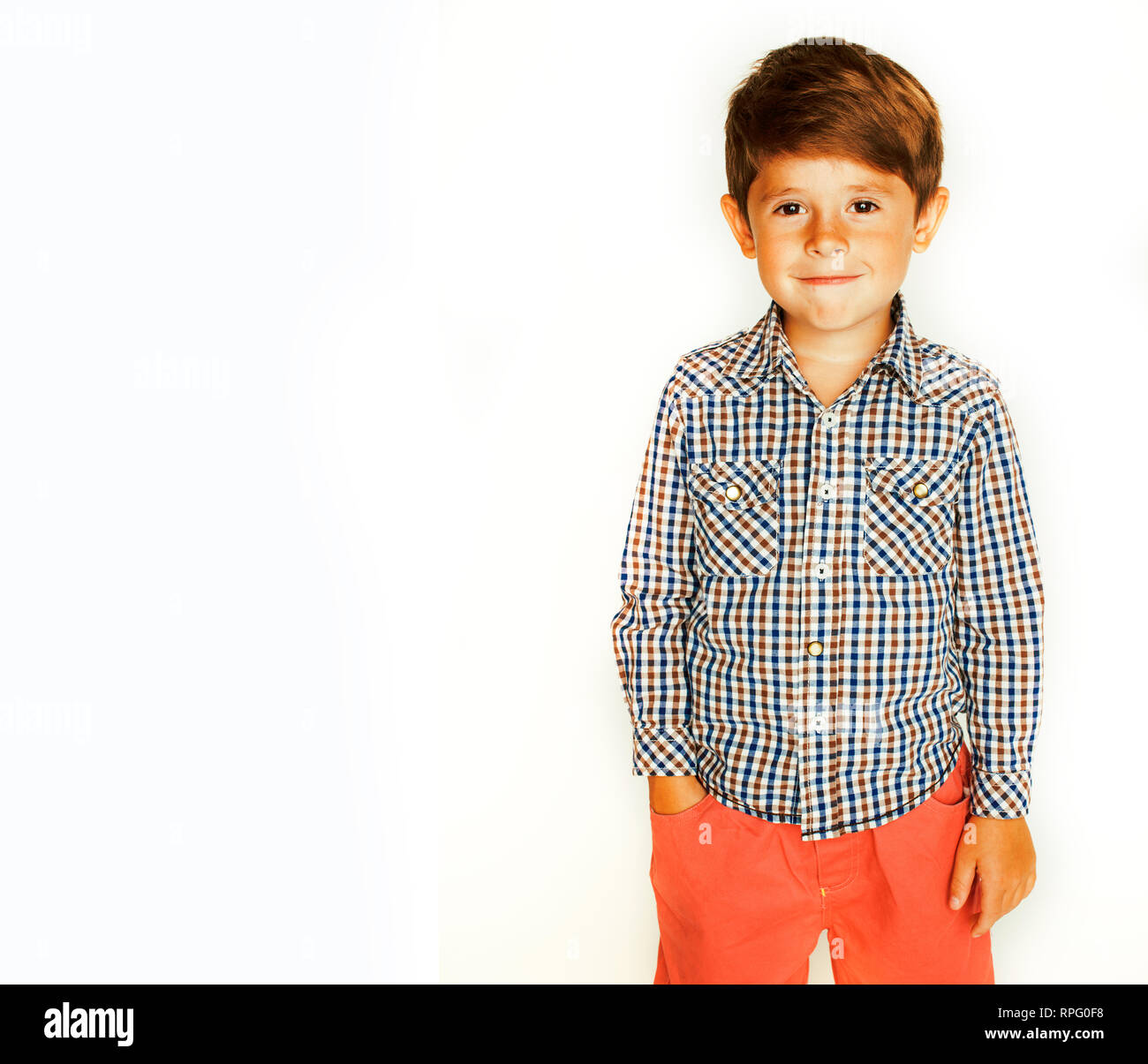little cute real boy on white background gesture smiling close up ...