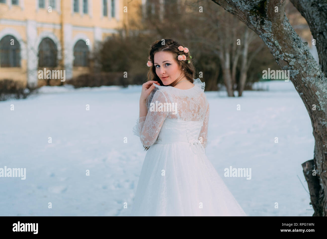Young wedding bride looking back hi-res stock photography and images ...