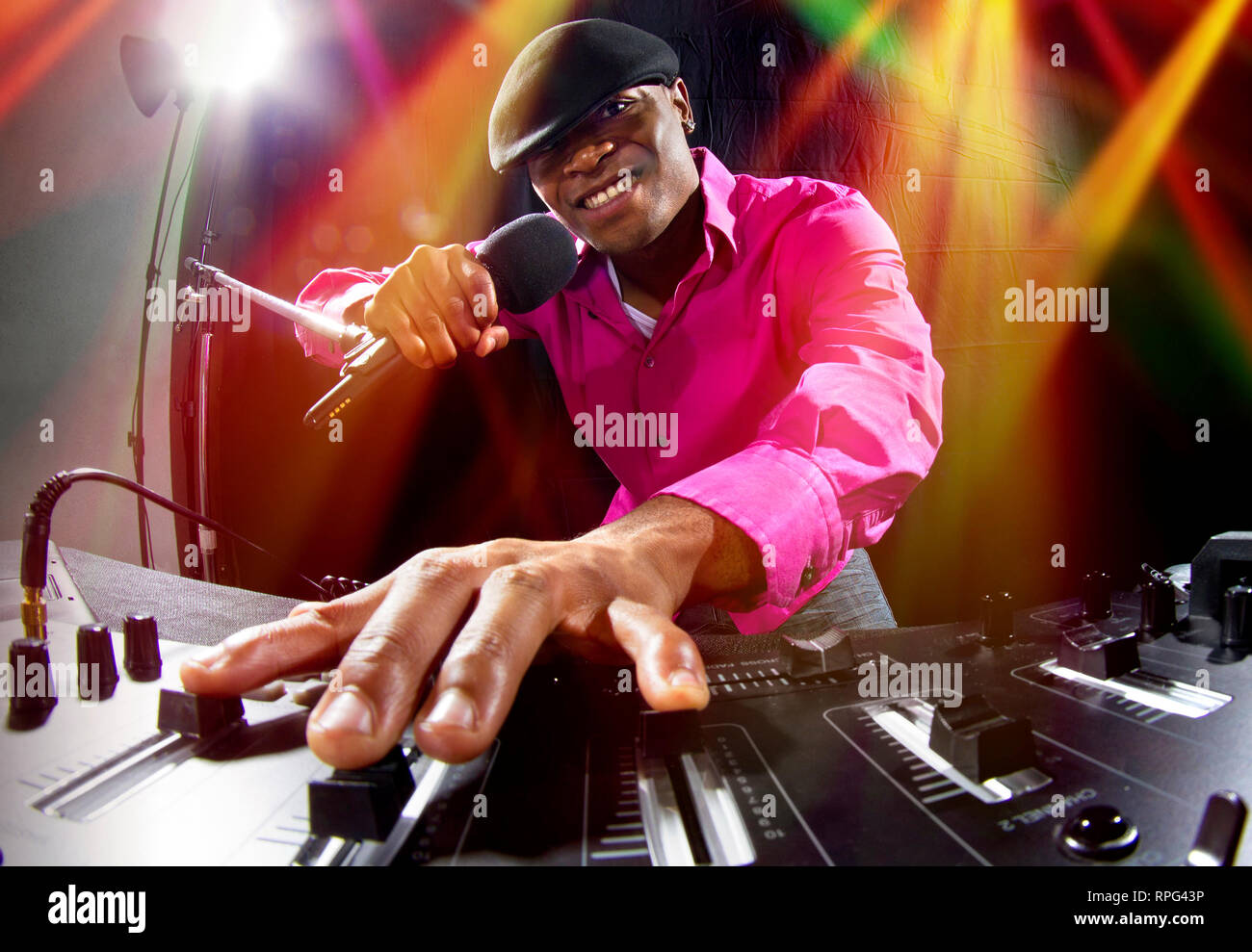 Cool African American male DJ playing music at a party Stock Photo - Alamy