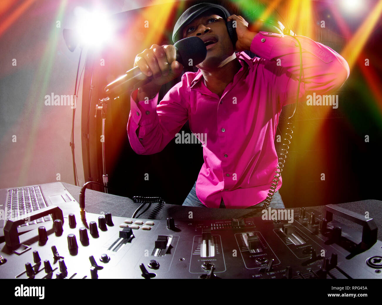 Cool African American male DJ playing music at a party Stock Photo - Alamy
