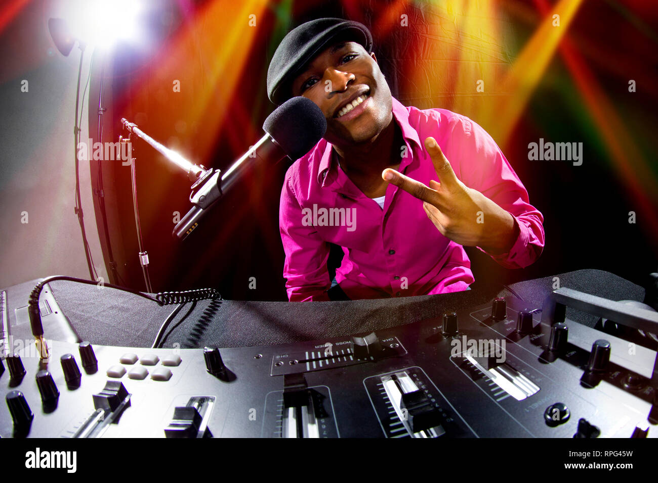 Cool African American male DJ playing music at a party Stock Photo - Alamy