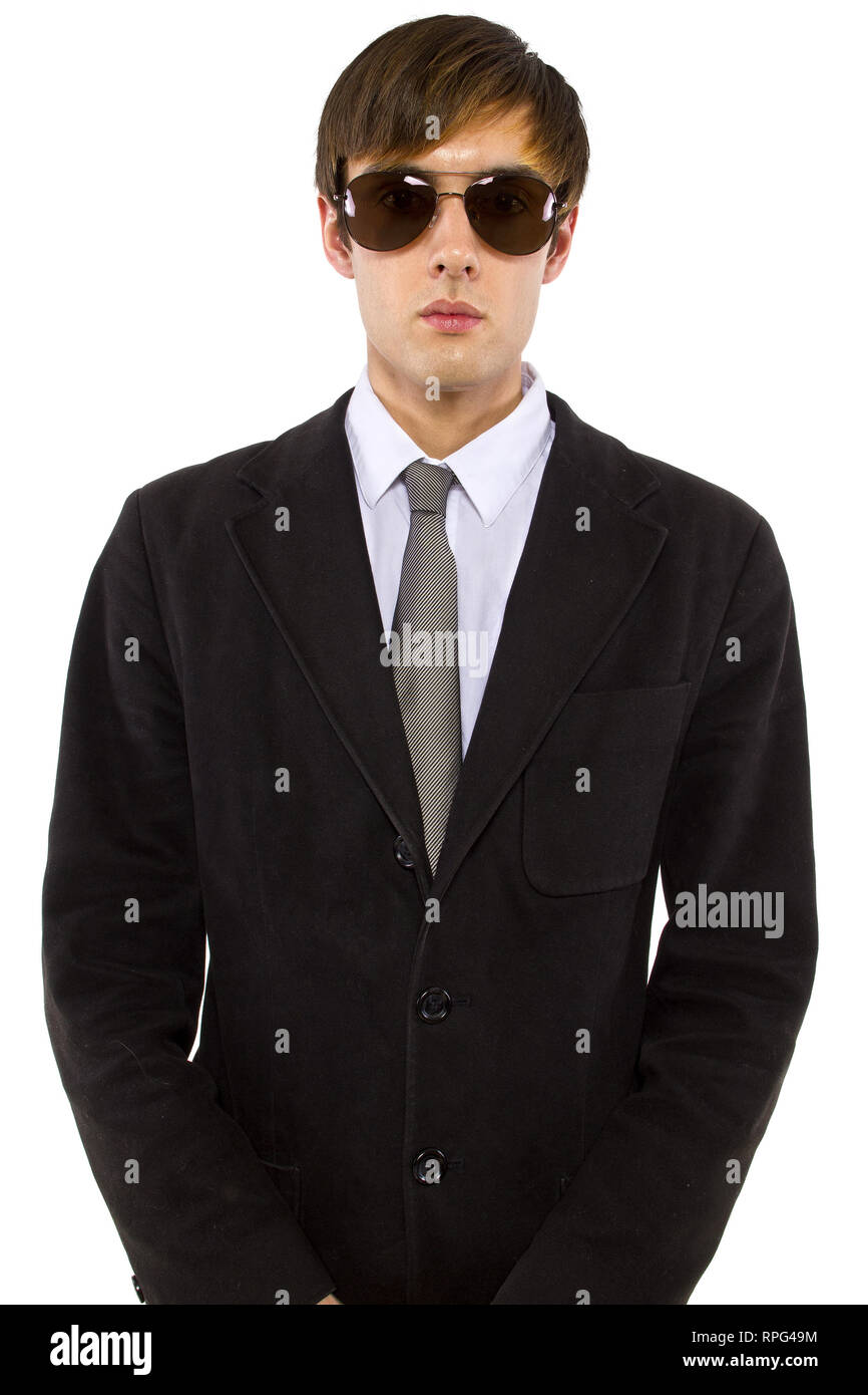 Caucasian male bodyguard wearing sunglasses and black suit Stock Photo ...