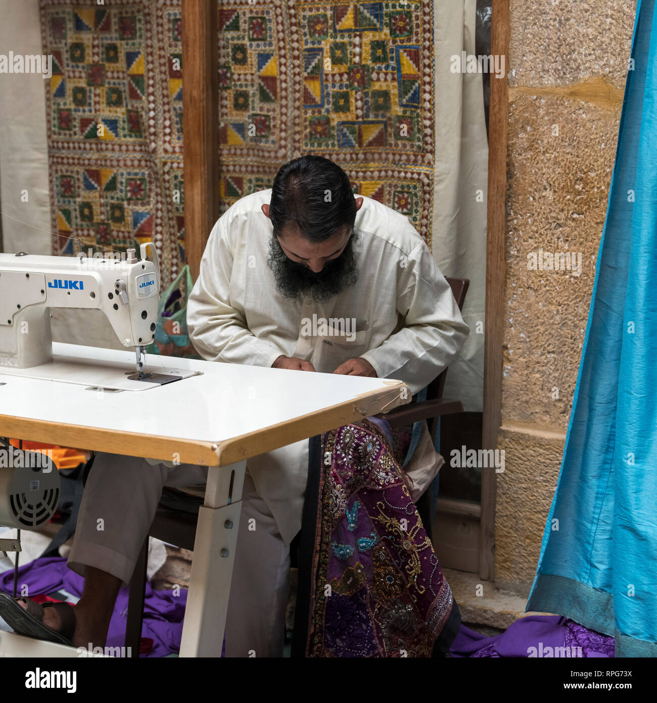 Indian tailor traditional sewing machine hi-res stock photography and ...