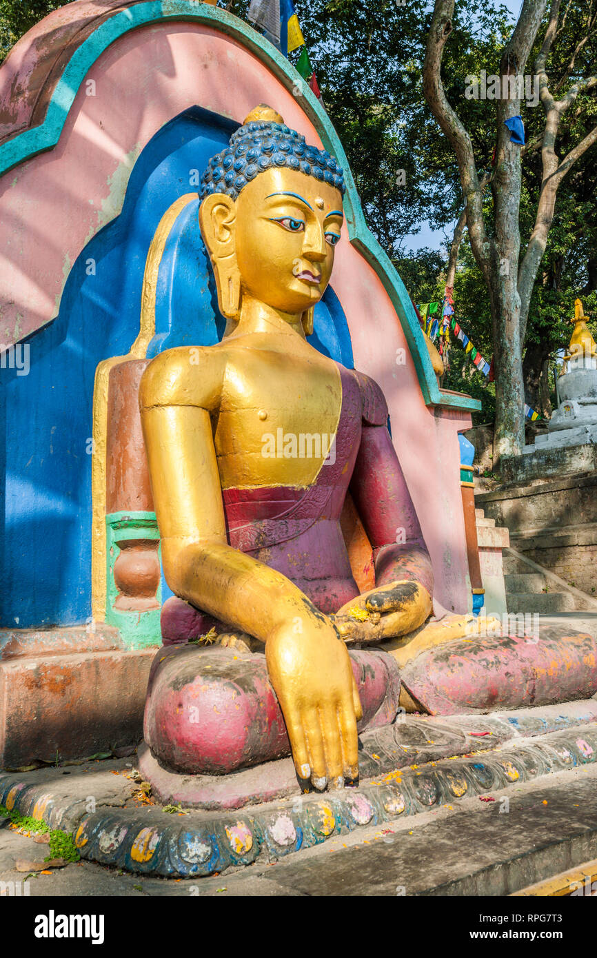 Nepal, Kathmandu, Swayambhu Stupa, golden sculpture of Lord Buddha ...