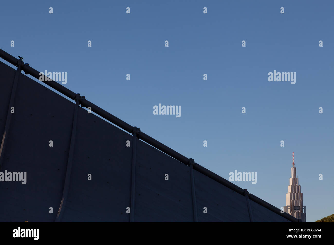 The Docomo Tower seen over the roof of the Yoyogi National Stadium ...