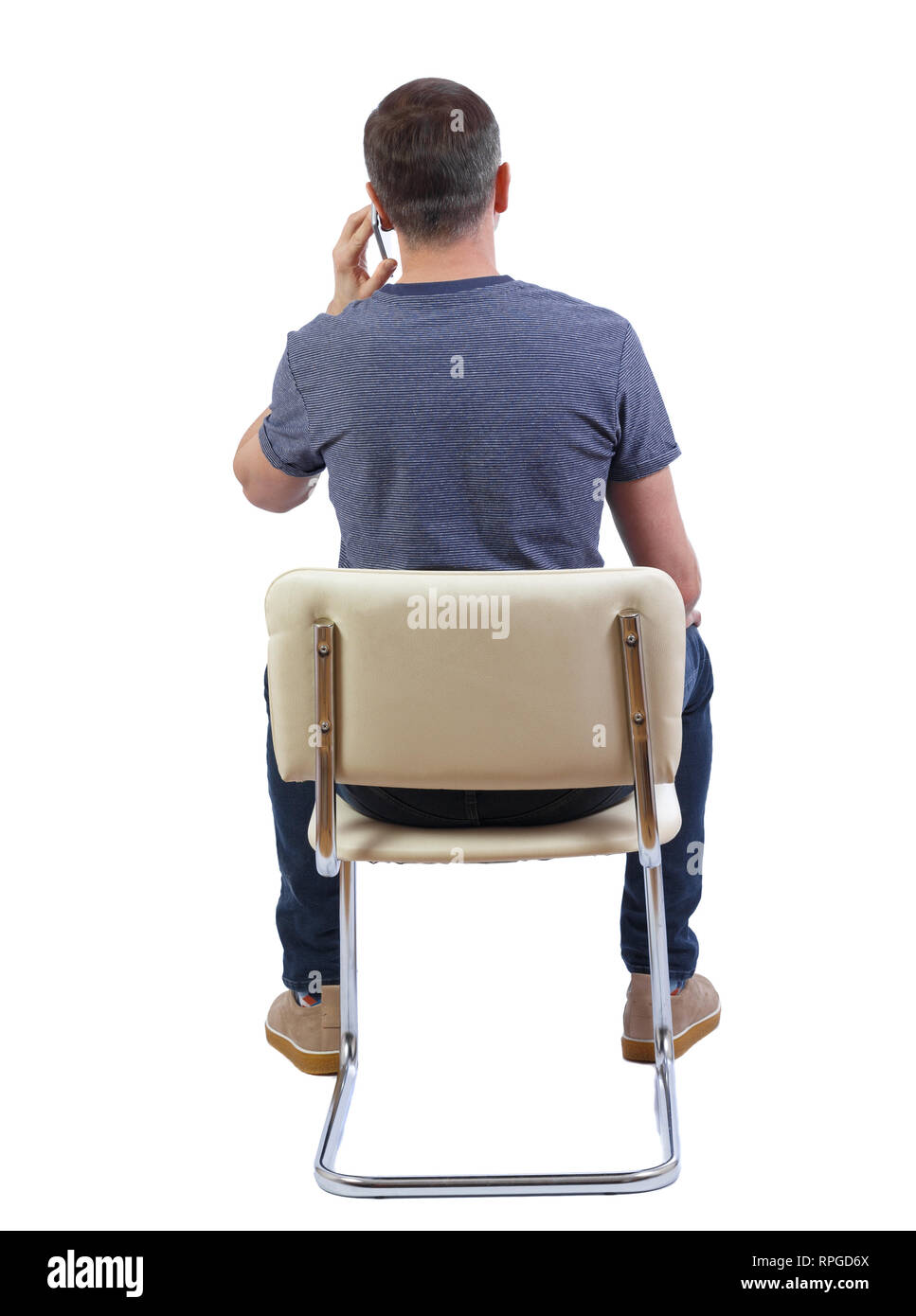 Back view of a man with a smartphone. Rear view people collection. The ...