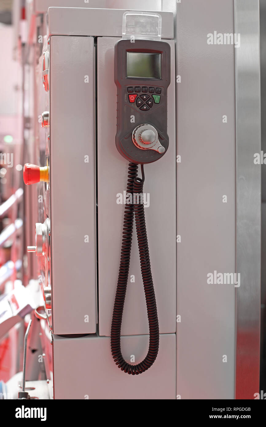 Wired Machine Remote Control With Display in Factory Stock Photo - Alamy