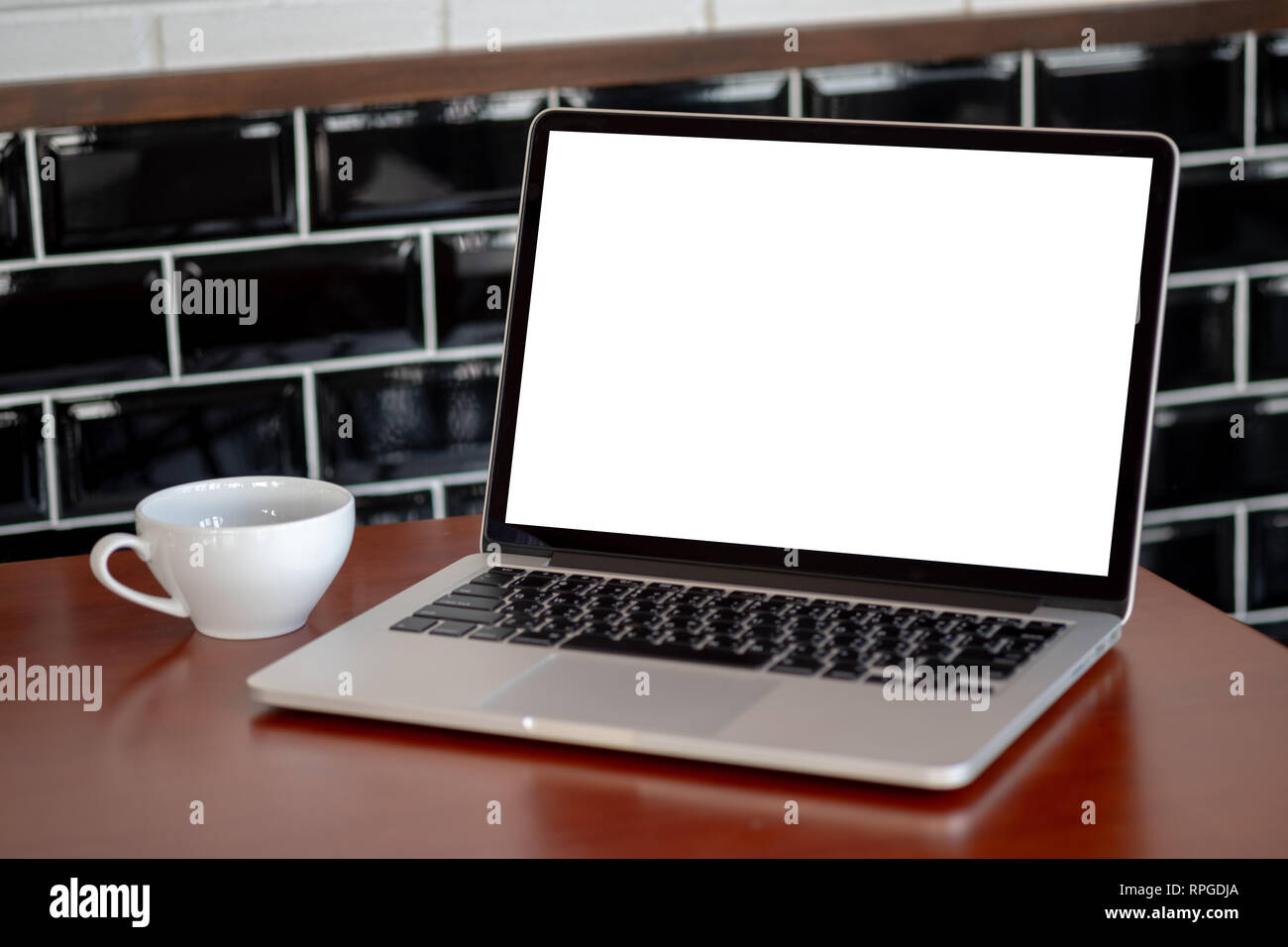 mock up Using laptop with blank screen computer modern Stock Photo - Alamy