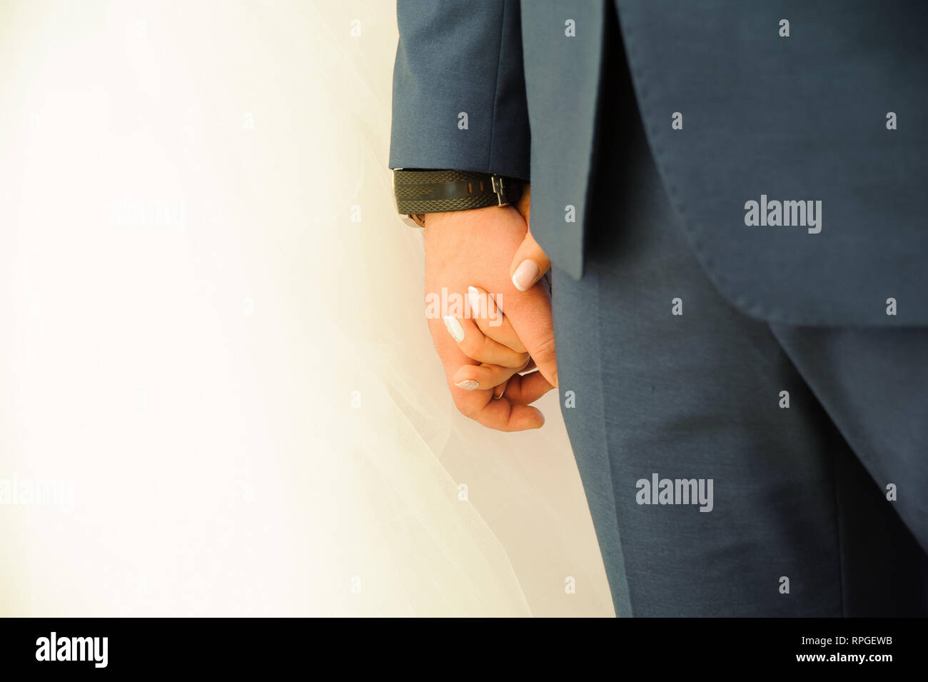 Beautiful bride wedding details as a background, hand in hand Stock ...