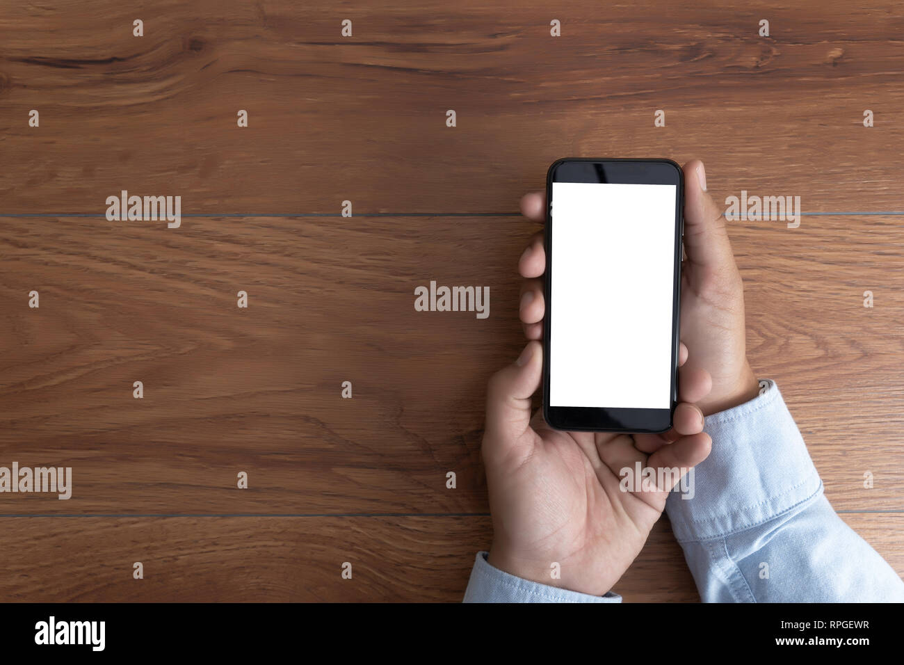 Man hand holding the black smartphone screen mockup Stock Photo - Alamy