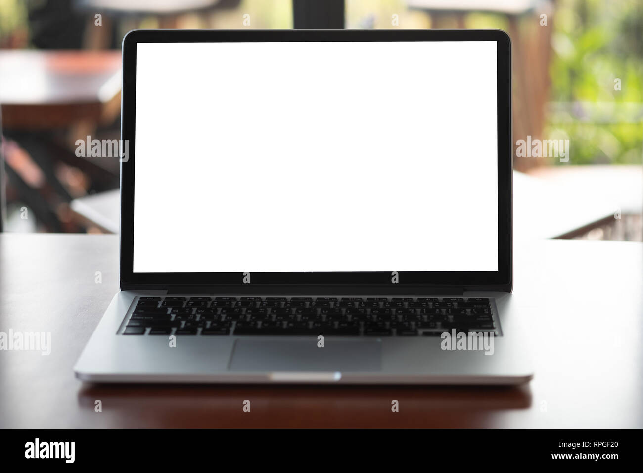 mock up Using laptop with blank screen computer modern Stock Photo - Alamy