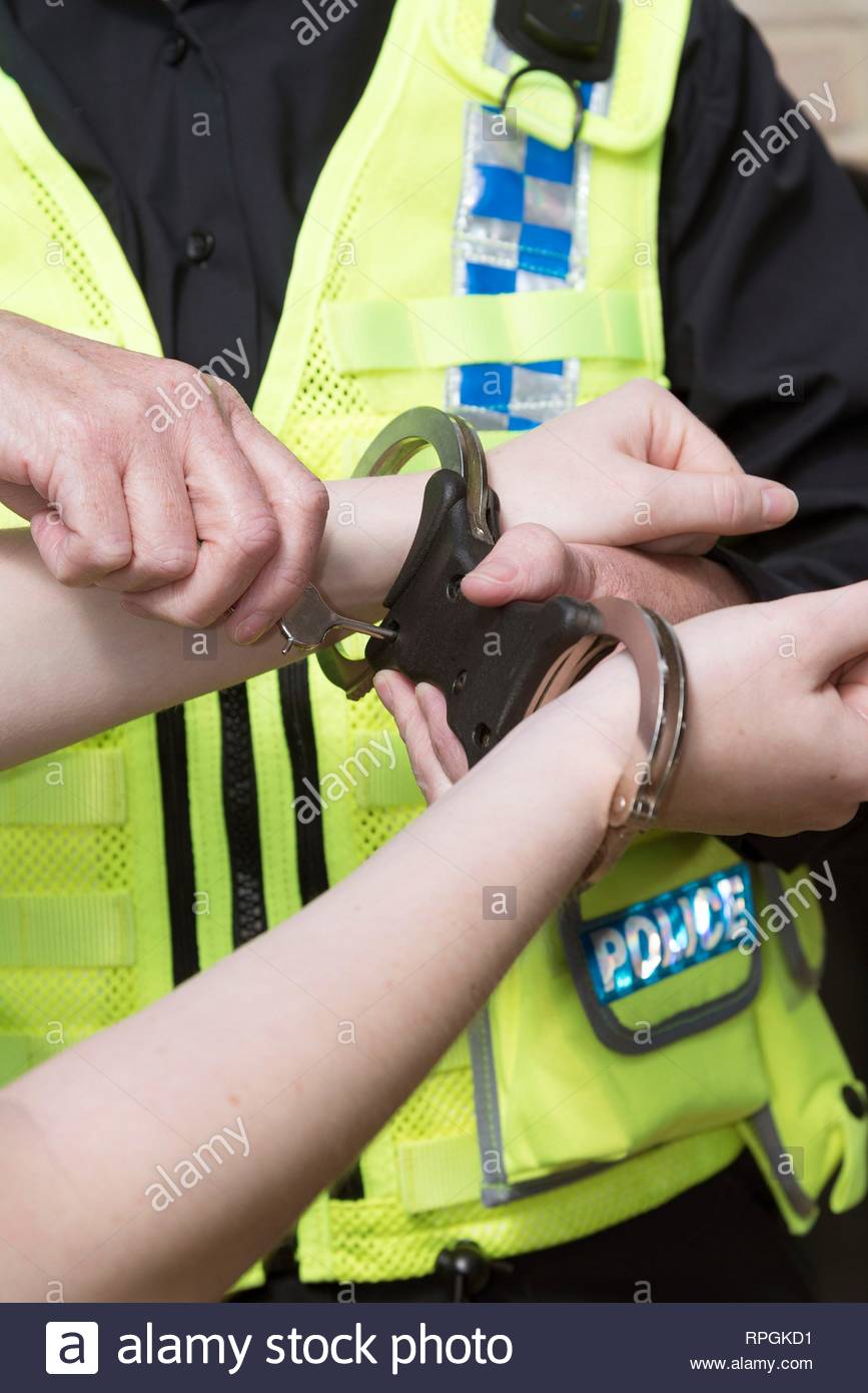 Wrists Handcuffs High Resolution Stock Photography and Images - Alamy