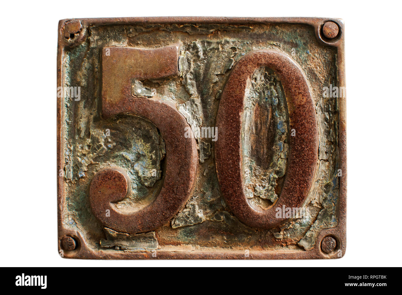 Old retro weathered cast iron plate with street number 50 closeup ...