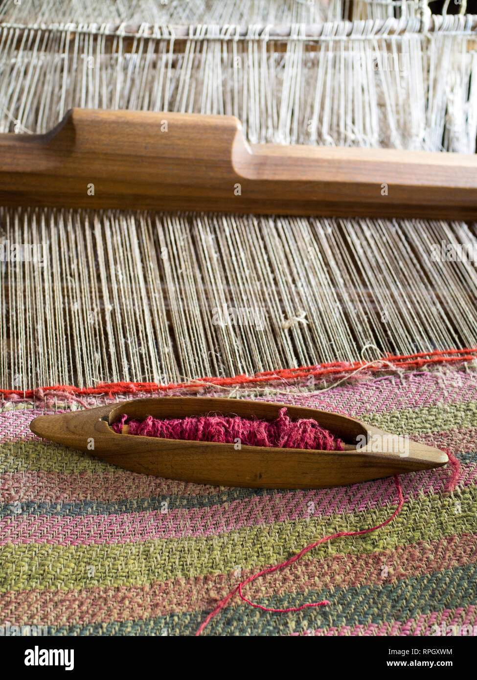 A loom set up in a traditional cottage in Old Orhei to show how people ...
