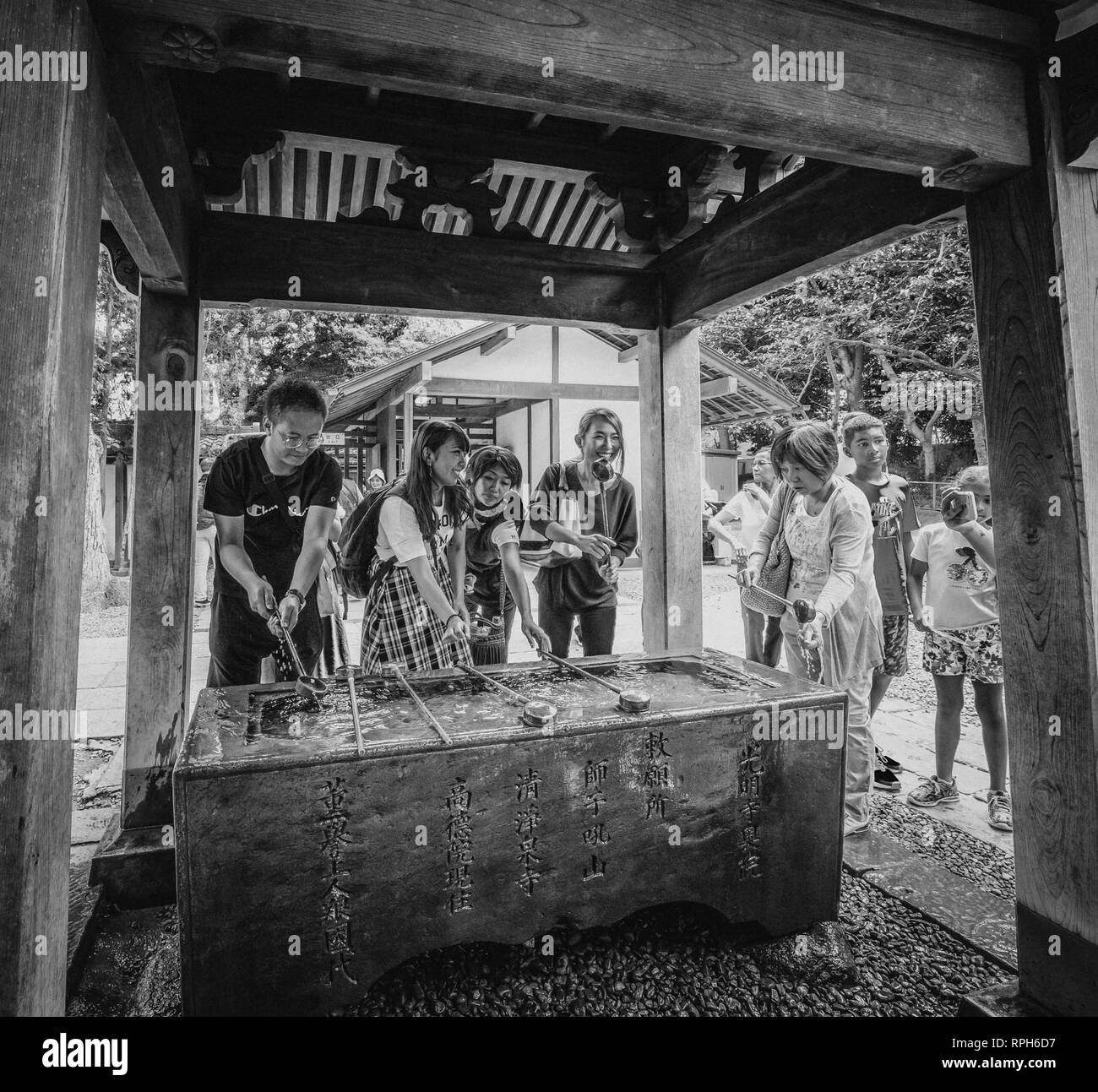 Ritual purification fountain at an japanese temple Black and White ...