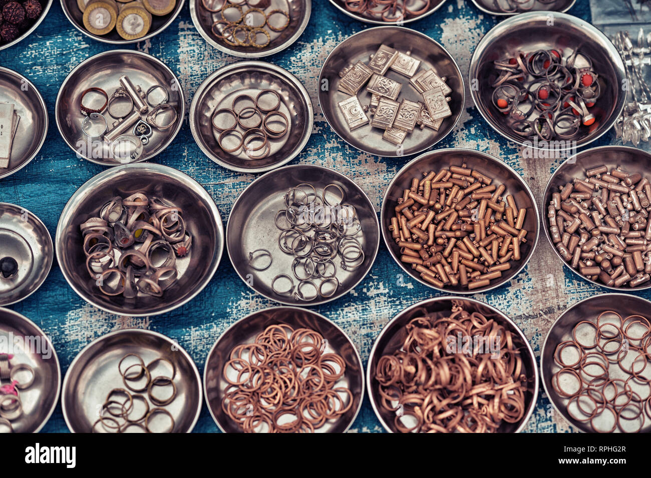 Different plates with various metal objects Stock Photo - Alamy