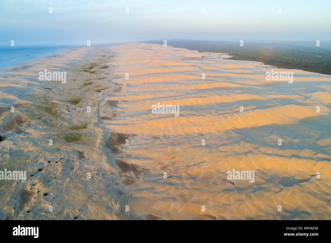 Aerial view of Stockton beach sand dunes at sunrise. Anna Bay, New ...