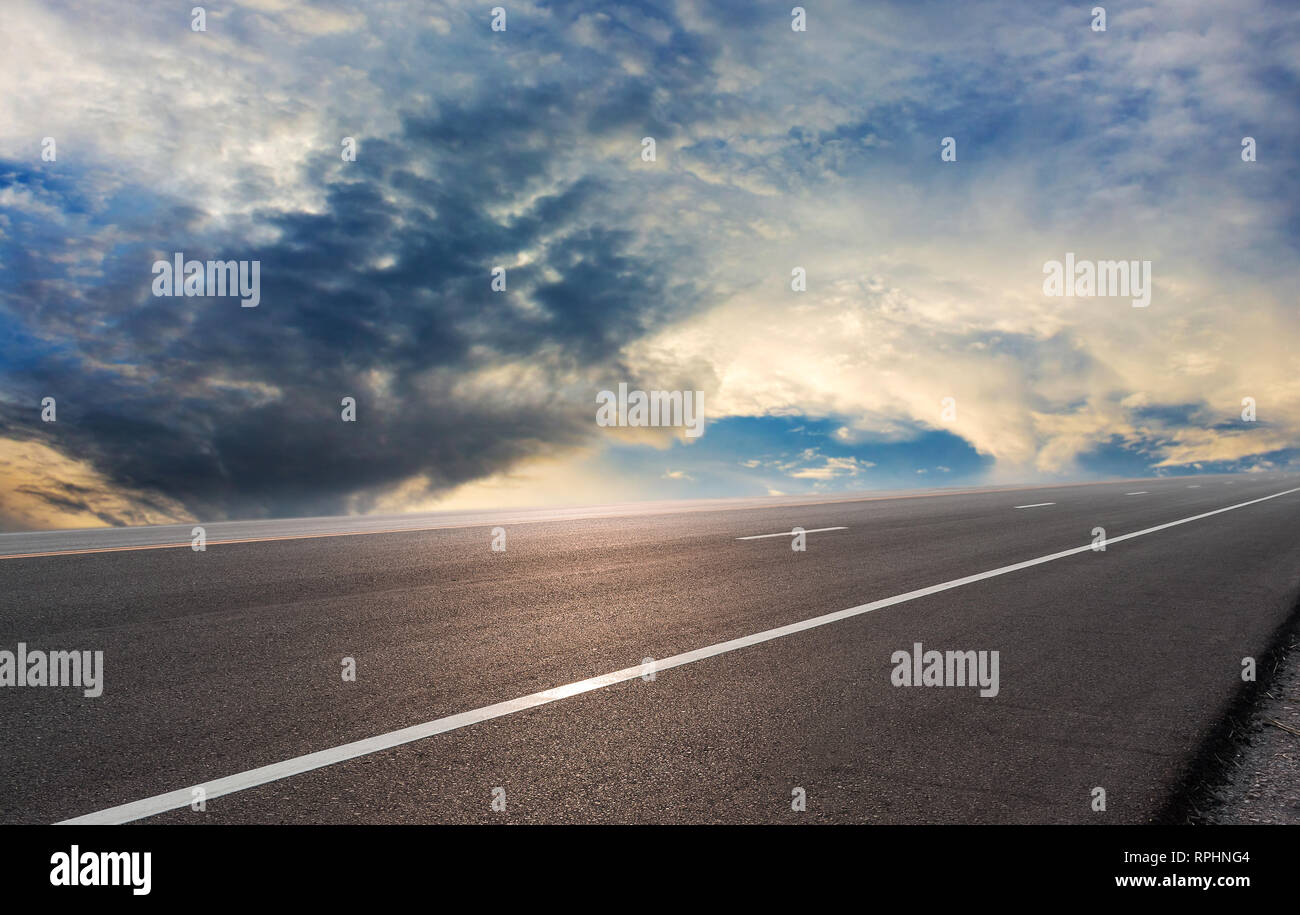Road asphalt and sky cloud background Stock Photo - Alamy