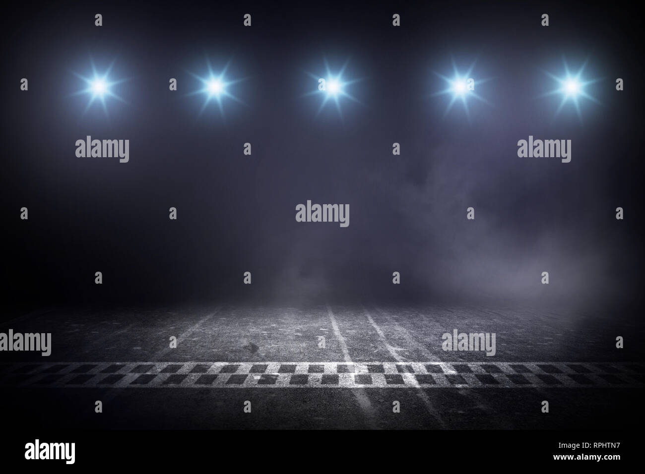 Race track finish line racing on night Stock Photo - Alamy