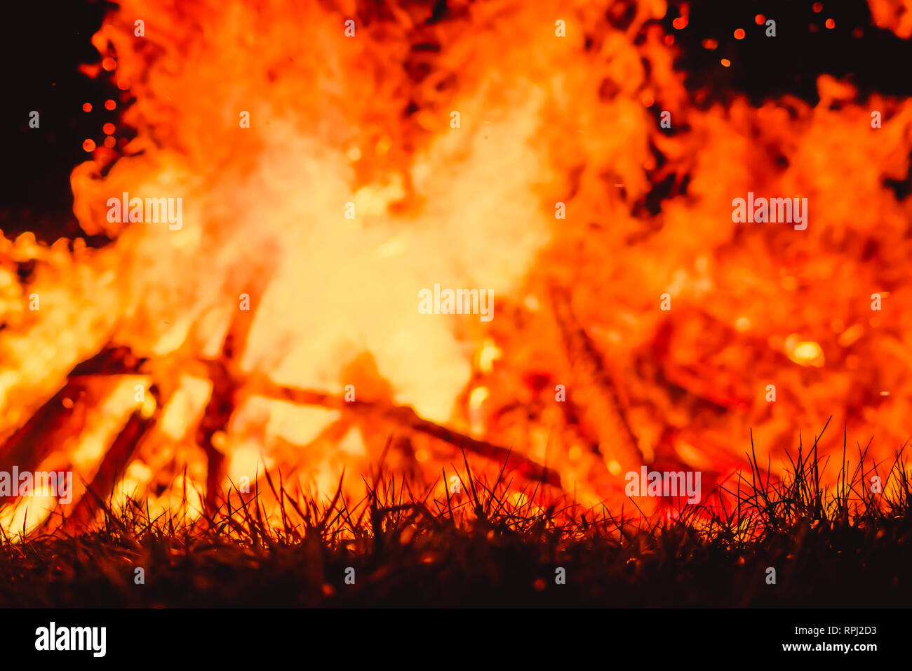 large flame on the field during a fire in nature Stock Photo - Alamy