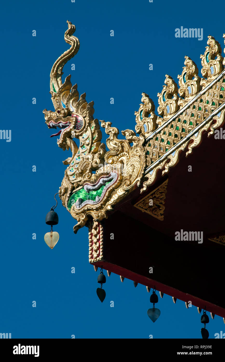 Chiang Rai Thailand, carved mystical serpent roof finials at Wat Sri ...