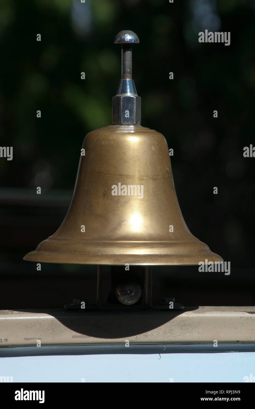 Chiang rai Thailand, simple brass bell on windowsill Stock Photo - Alamy