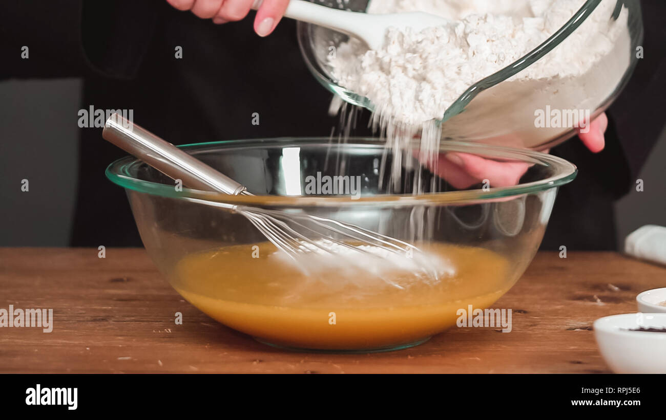 Step by step. Mixing organic ingredients in the glass bowl to bake ...