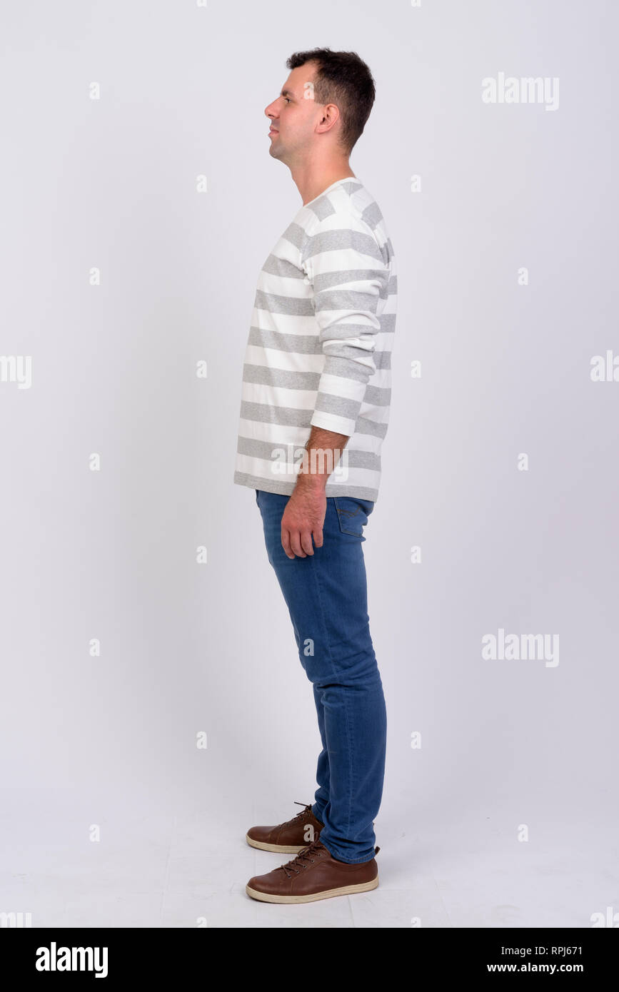 Full body shot profile view of man Stock Photo - Alamy