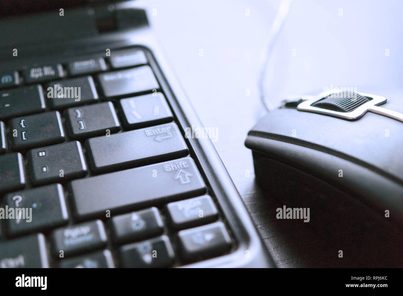 Closeup Image of Wired Computer Mouse and Laptop Keyboard. E-commerce ...