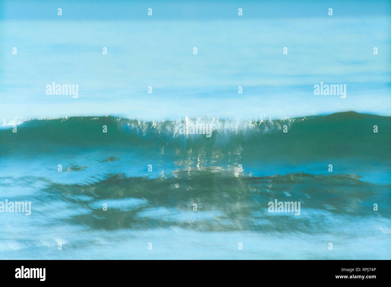 Closeup of breaking wave, motion blur Stock Photo - Alamy