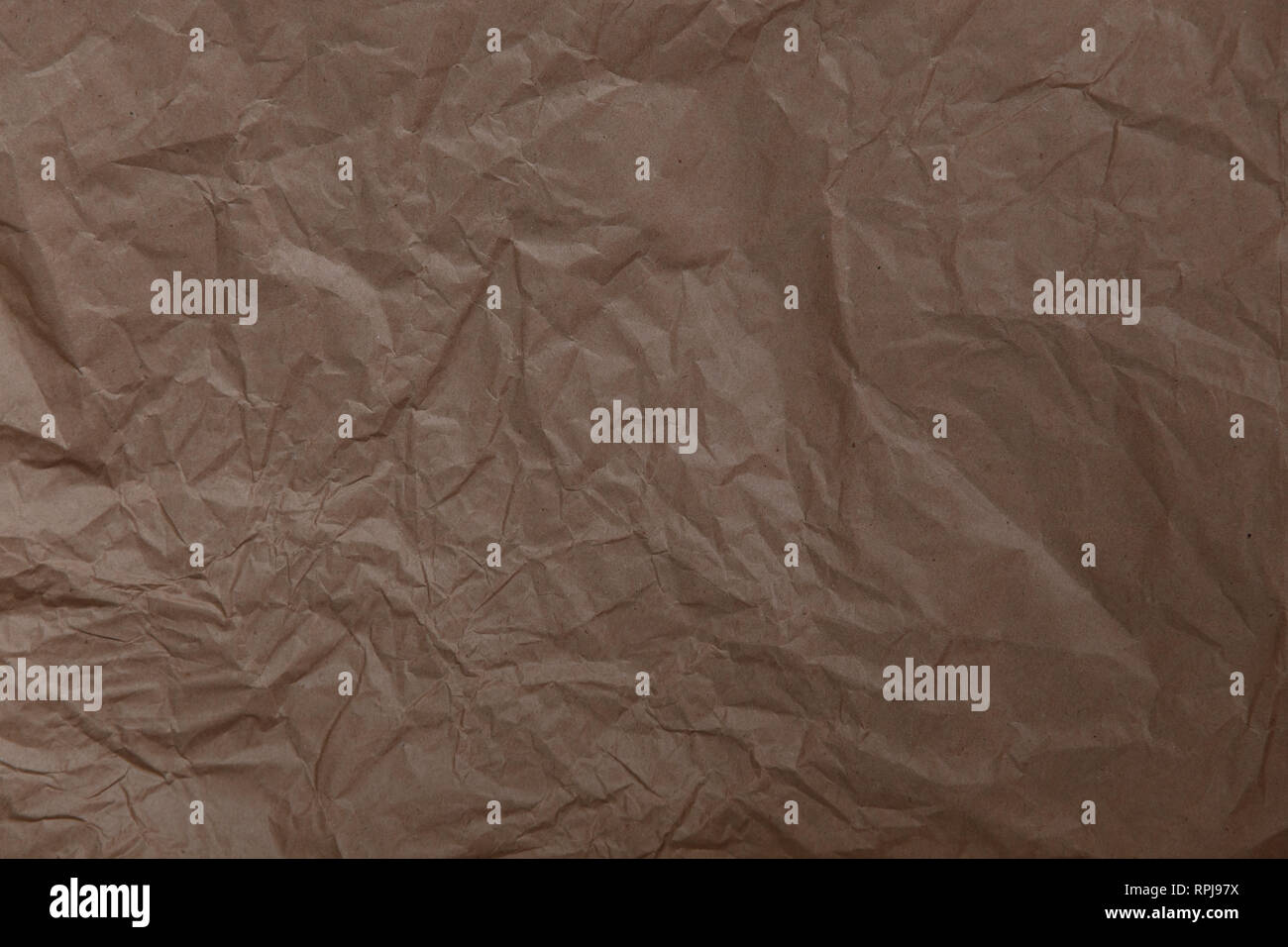 Brown crumpled wrapping paper as background. paper textures concept ...