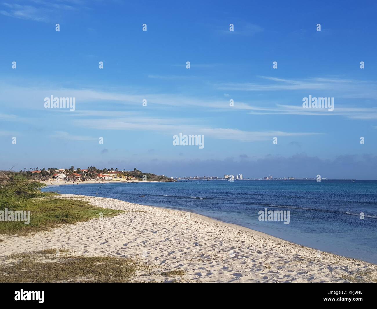 Wonderful Aruban beach with deep blue water Stock Photo - Alamy