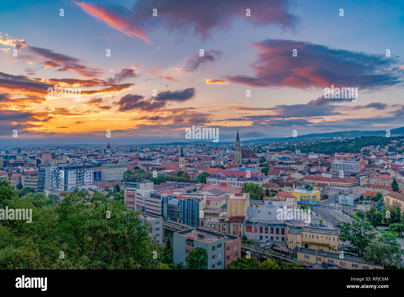 Cluj city overview at sunrise from Cetatuia Hill in Cluj-Napoca ...