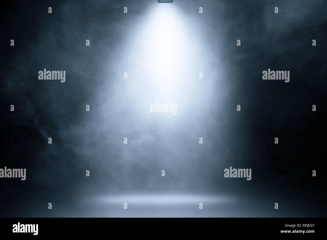 blue spotlight smoke studio entertainment background Stock Photo - Alamy