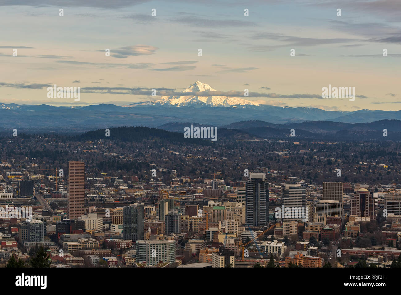 Mount Hood view over downtown Portland cityscape in the afternoon ...