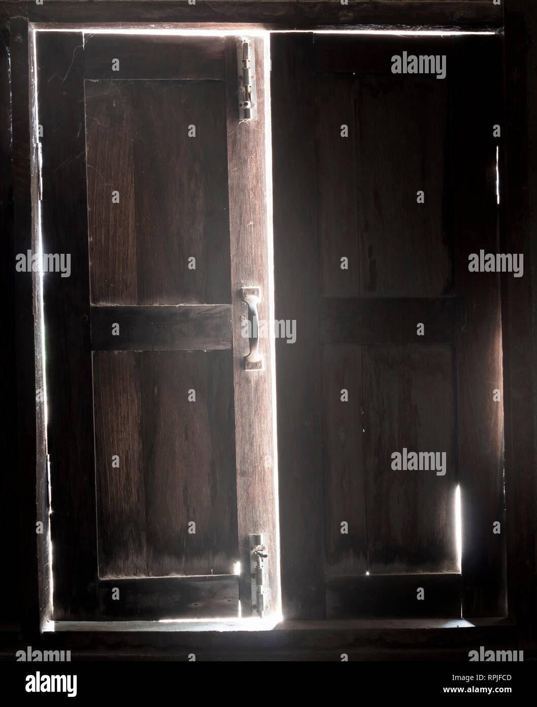 Old wooden window with light through Stock Photo - Alamy