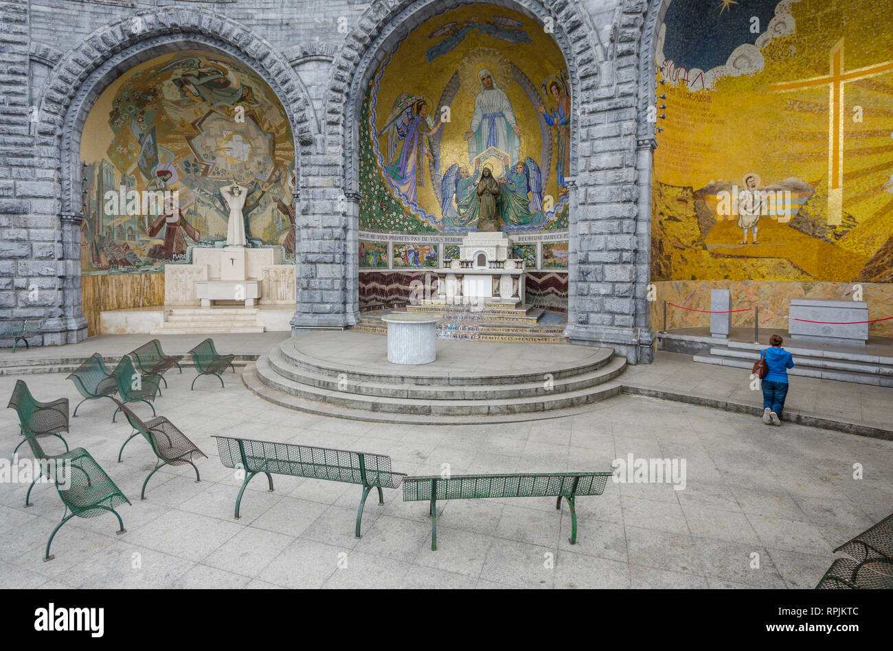 FRANCE LOURDES SEP 2018 view of woman praying near of basilica in ...