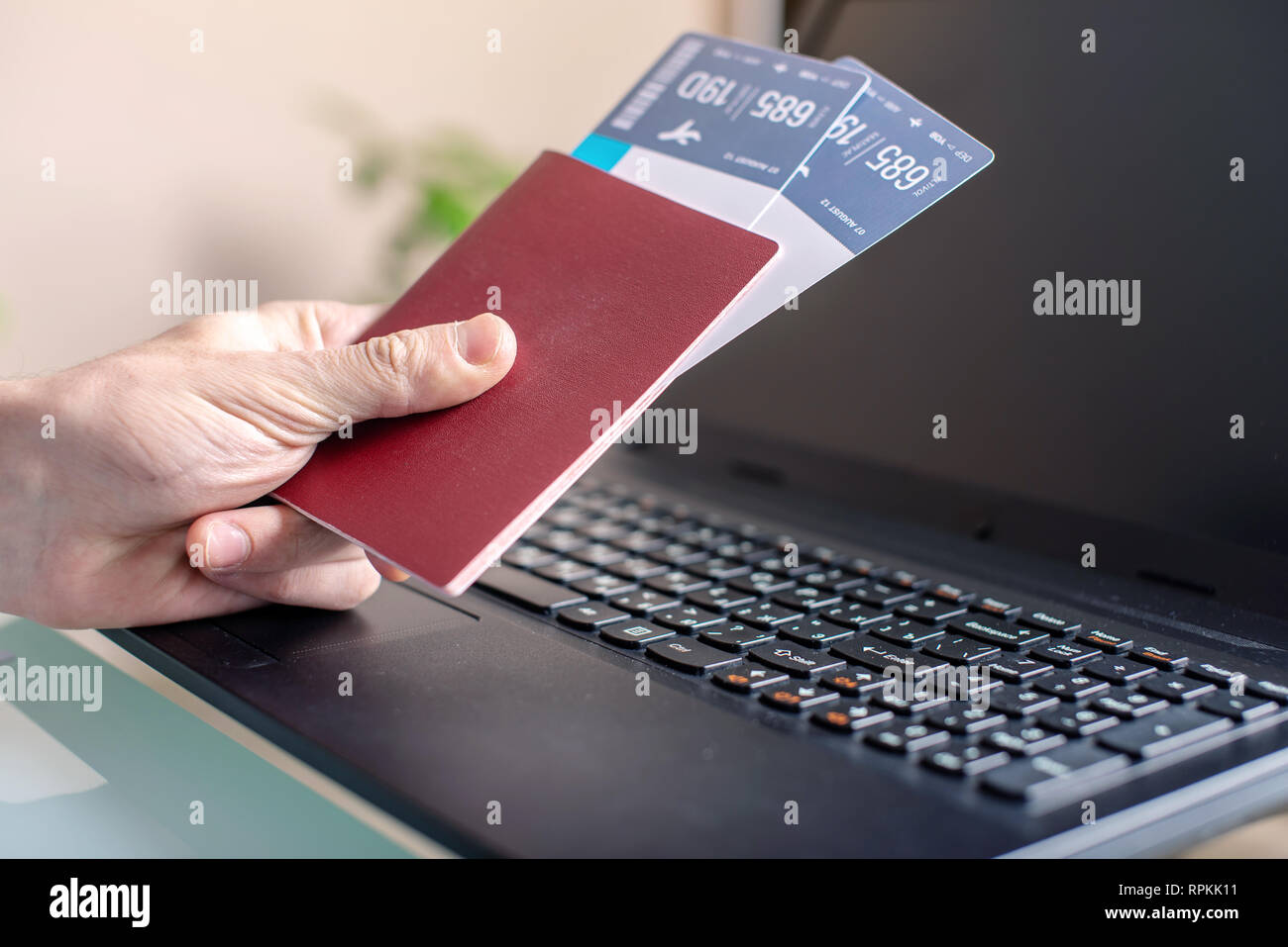 Airline ticket in hand hi-res stock photography and images - Alamy