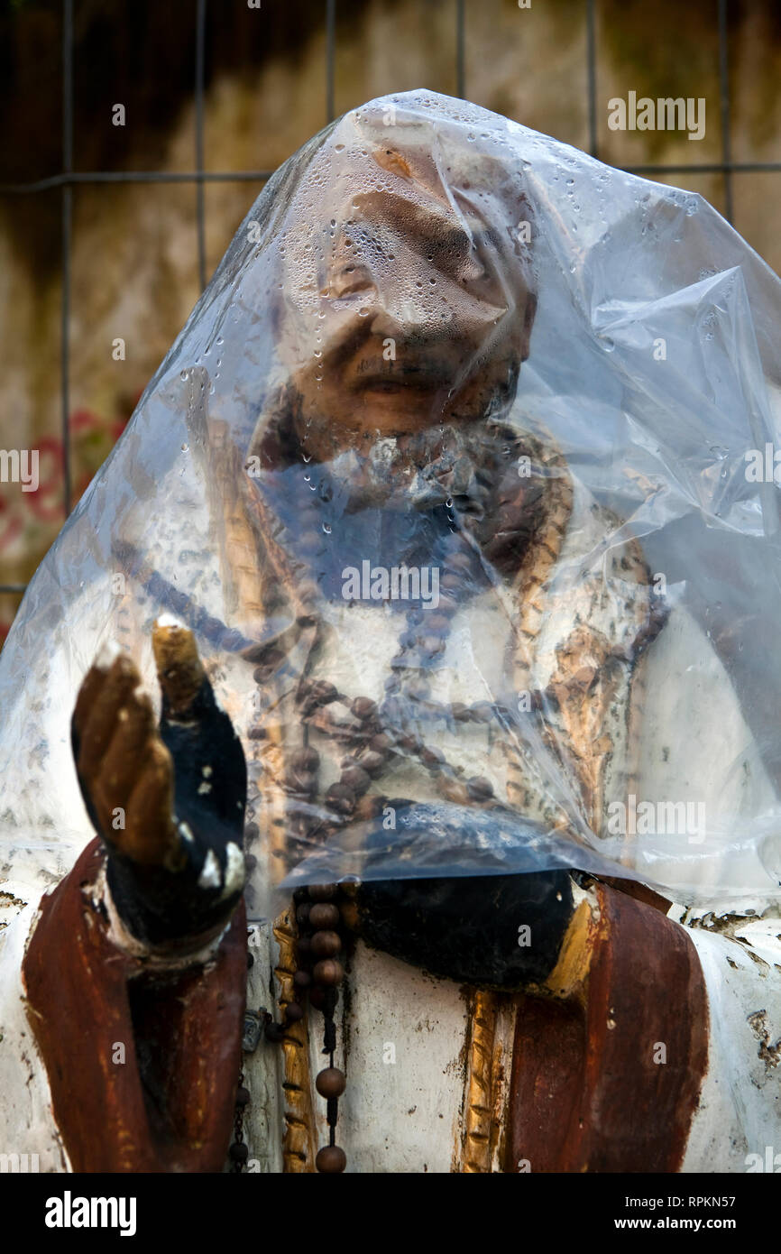 NAPLES - Icon of Padre Pio with a plastic bag to protect him from the ...