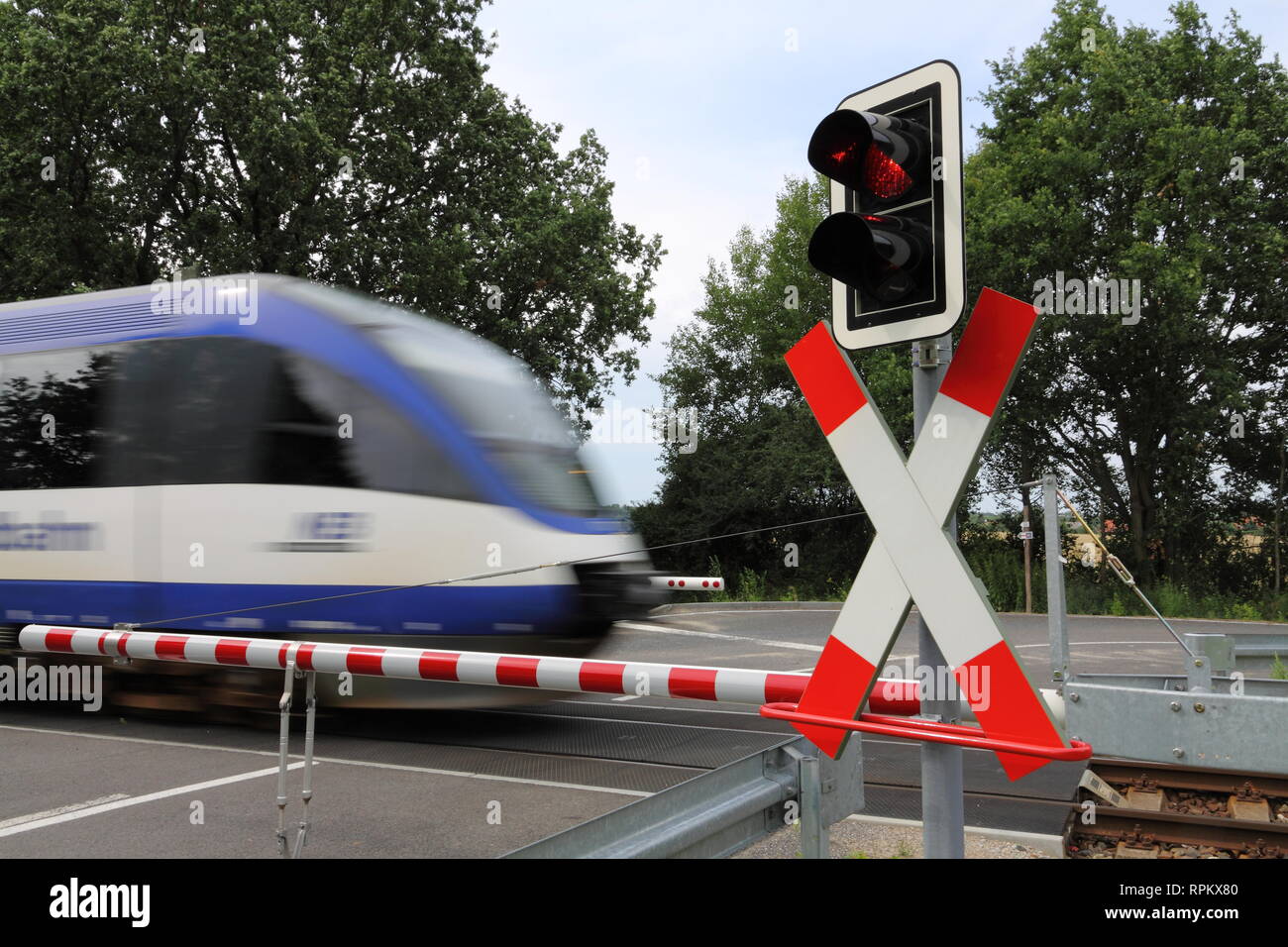 Railroad crossing gate arm hi-res stock photography and images - Alamy