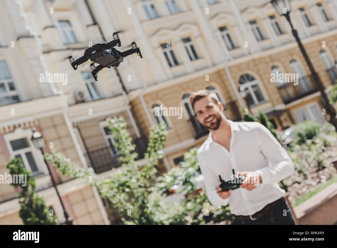 Drone flight above man walking hi-res stock photography and images - Alamy